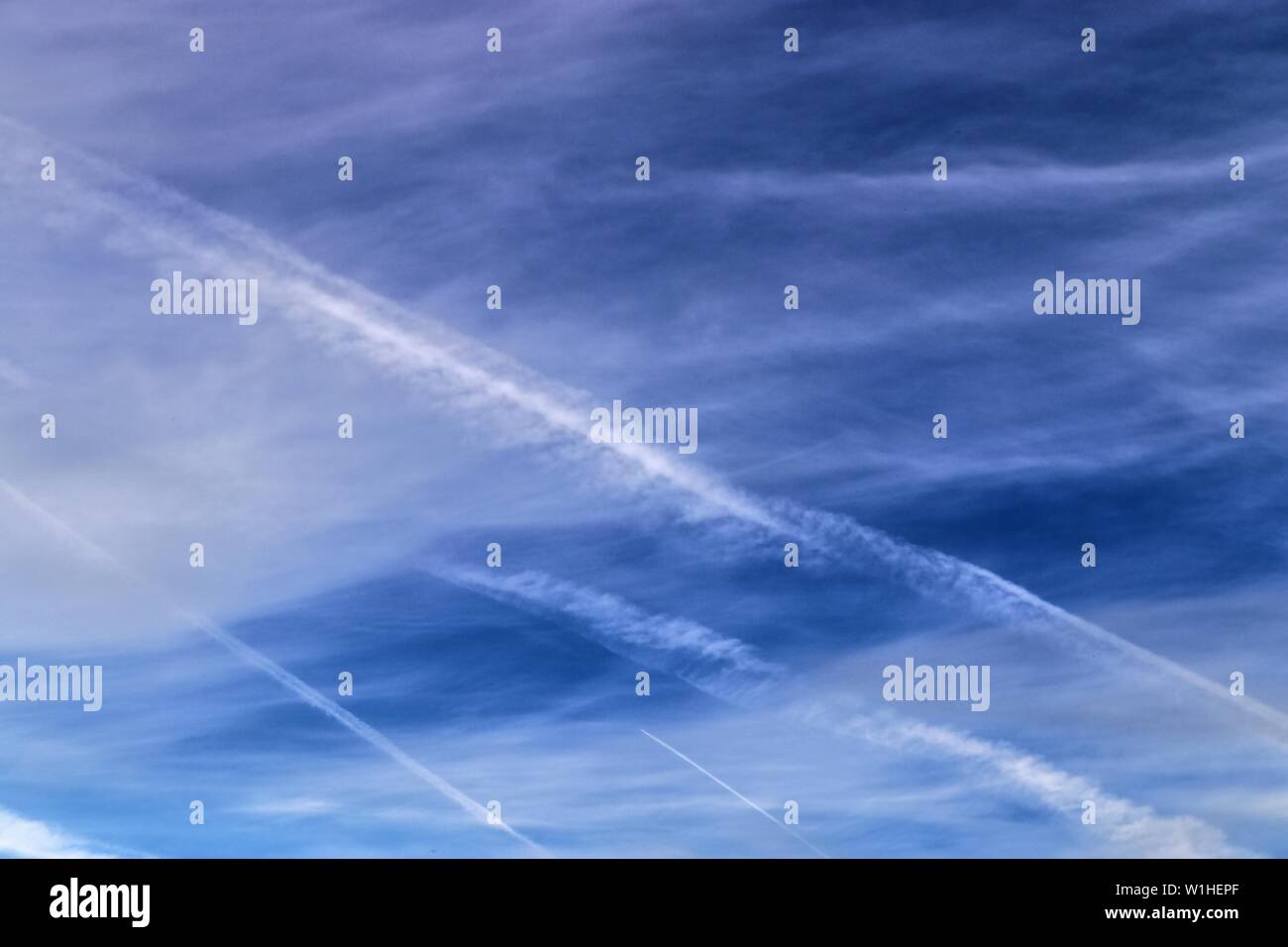 Airplane flying on deep blue hi-res stock photography and images - Alamy