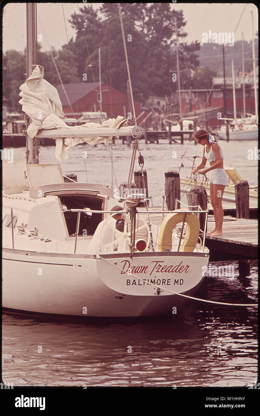 PREPARING TO SAIL FROM MOORING IN ANNAPOLIS HARBOR Stock Photo - Alamy