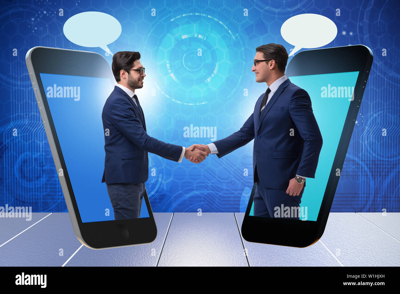 Concept of communication with businessmen handshaking Stock Photo - Alamy