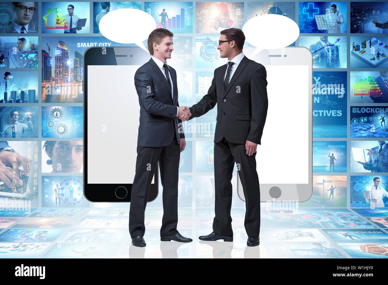Concept of communication with businessmen handshaking Stock Photo - Alamy