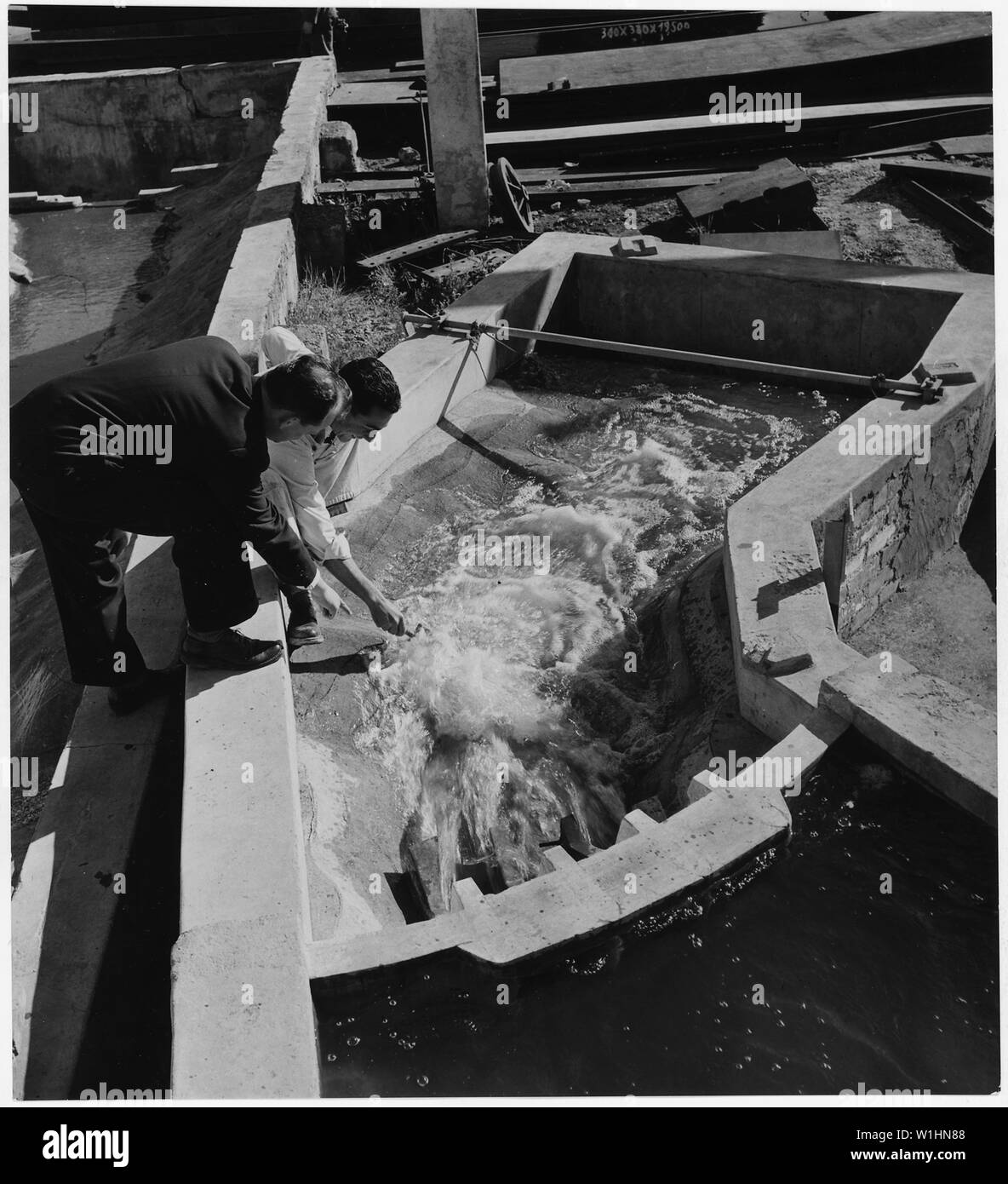 Portugal. Tests are carried out on a small scale model of the spillway ...