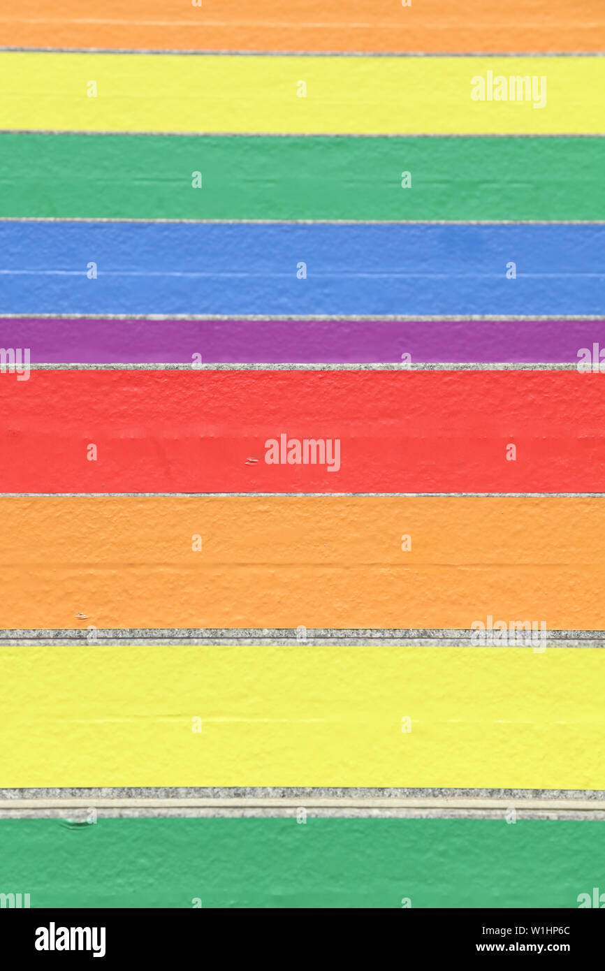 Colourful painted steps forming an irregular colour pattern Stock Photo ...