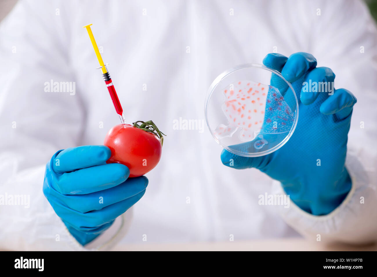 Male nutrition expert testing food products in lab Stock Photo - Alamy