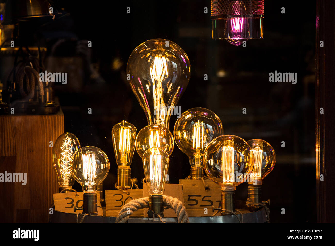 Decorative antique edison style filament light bulbs hanging Stock ...