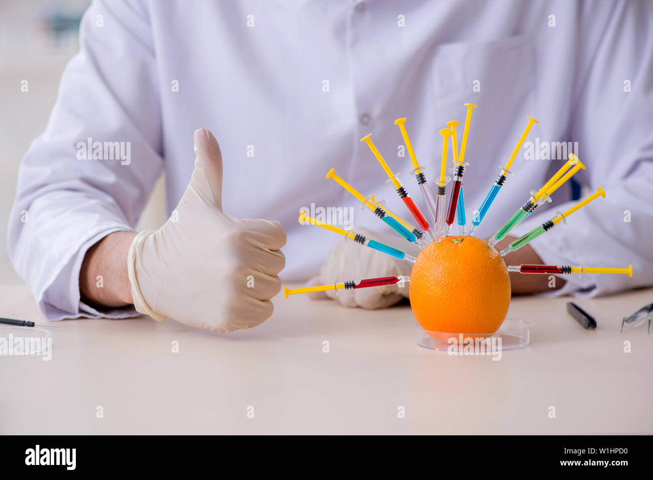 Male nutrition expert testing food products in lab Stock Photo - Alamy