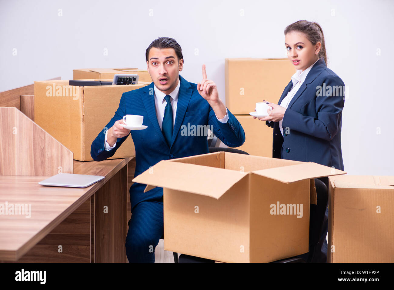 Two employees being fired from their work Stock Photo - Alamy