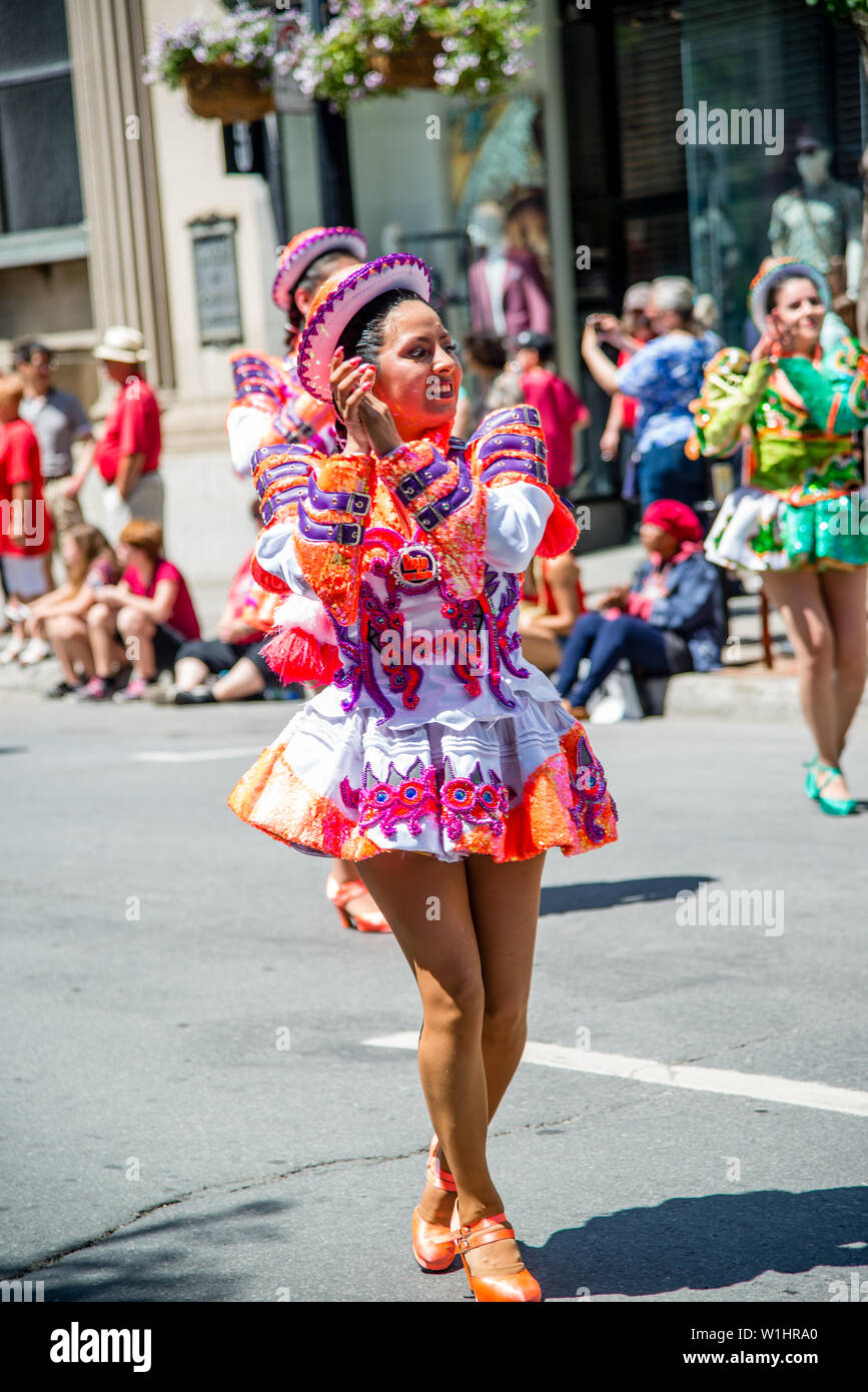 The parade of Canadian National Day in downtown Montreal Stock Photo ...