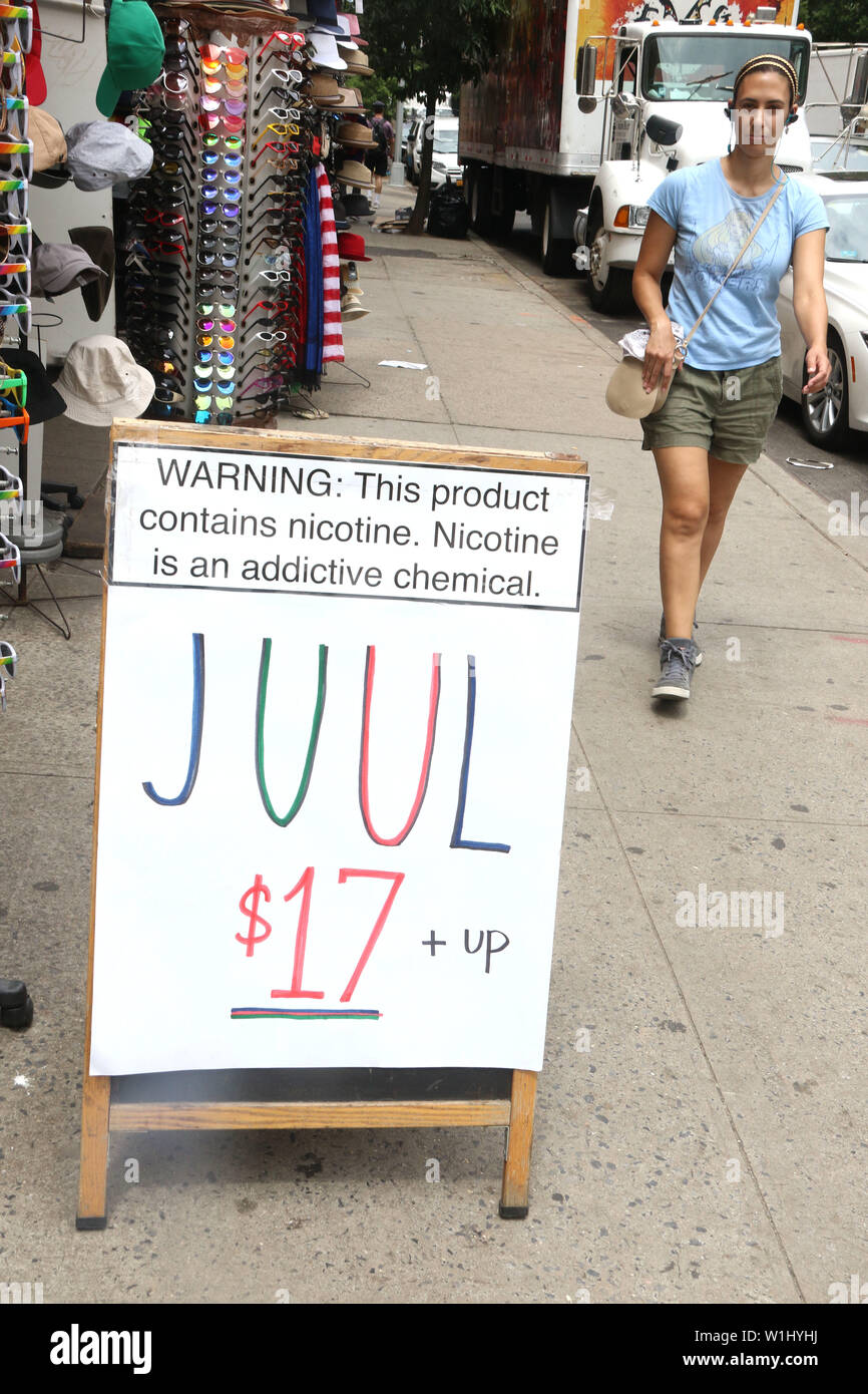 New York City, New York, USA. 2nd July, 2019. A JUUL sign on display in ...