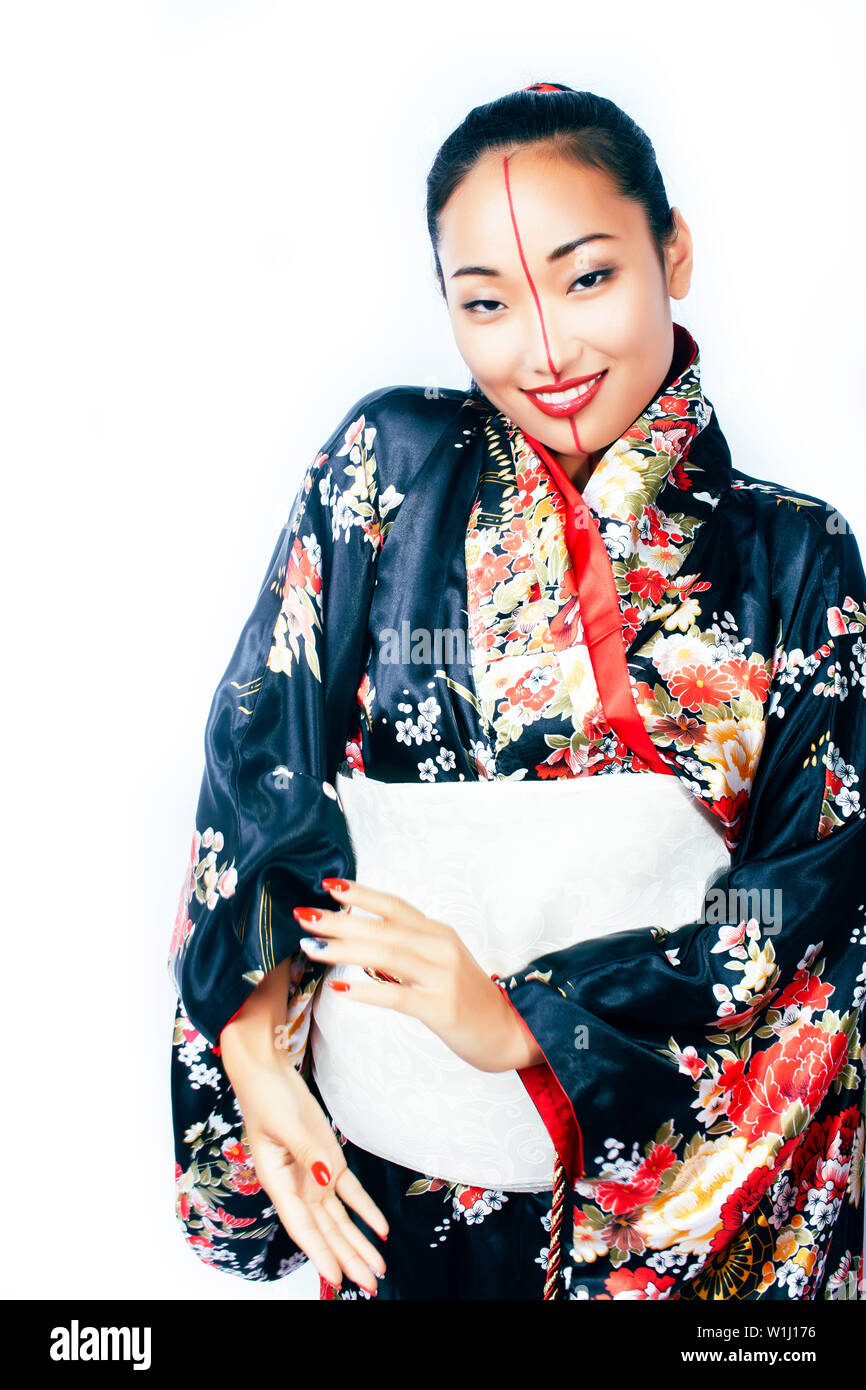 young pretty real geisha in kimono with sakura and decoration on white ...
