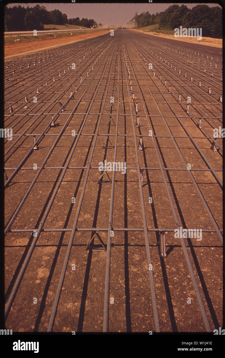 STEEL RODS, MADE FROM SHREDDED AUTOS, ARE BEING USED FOR REINFORCEMENT ...