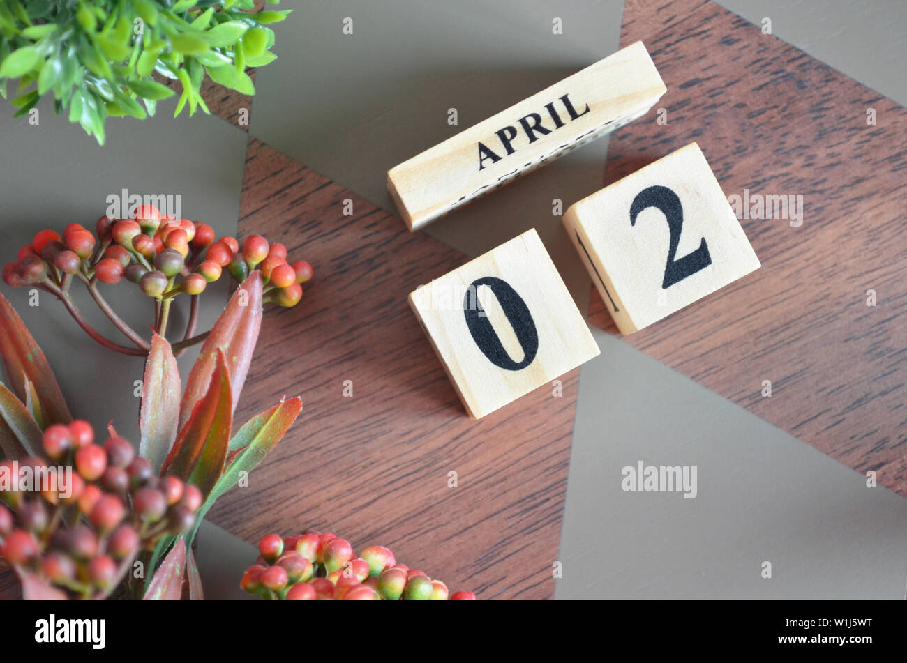 Date of April month. Diamond wood table for background Stock Photo - Alamy