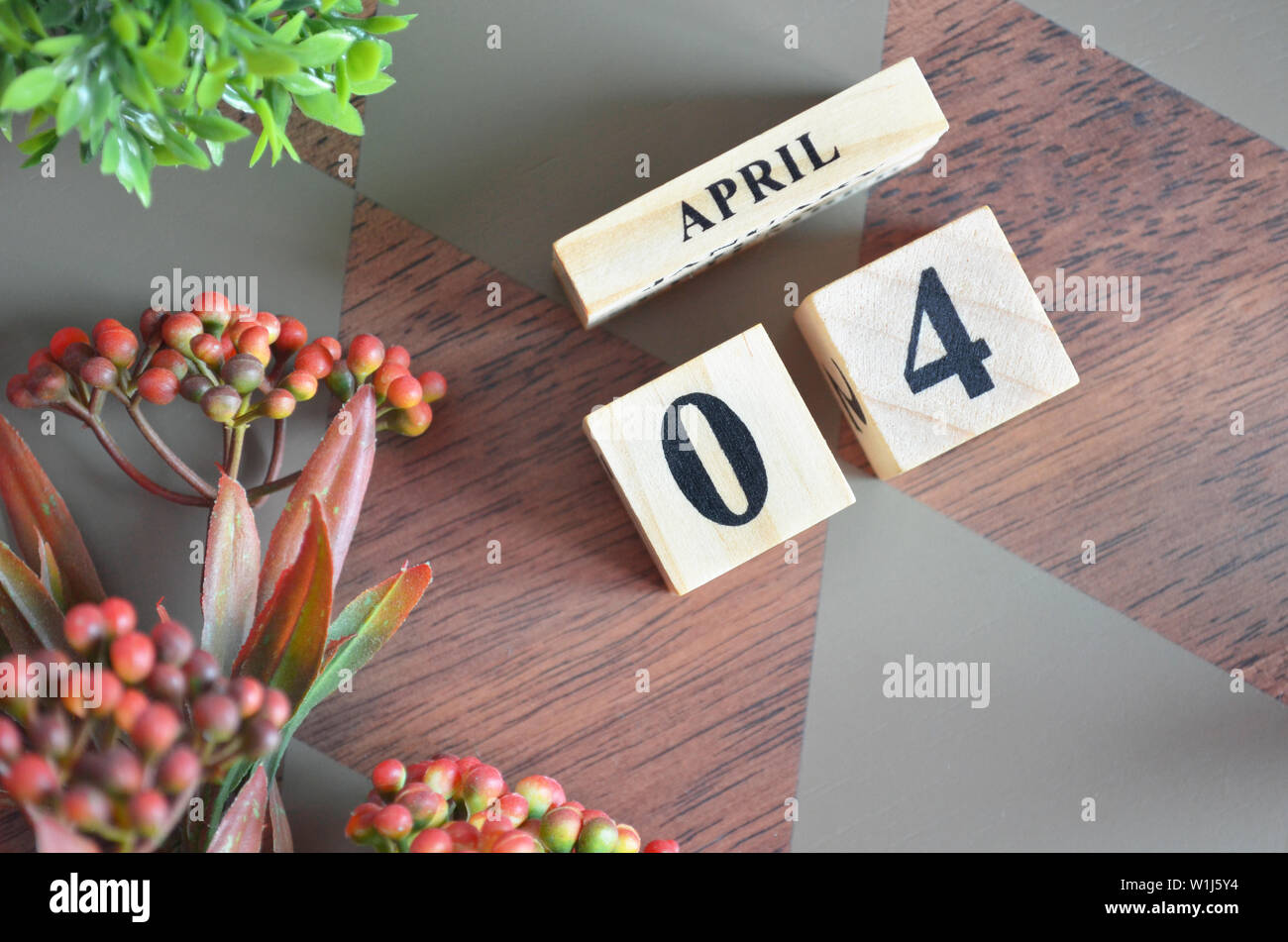 Date of April month. Diamond wood table for background Stock Photo - Alamy