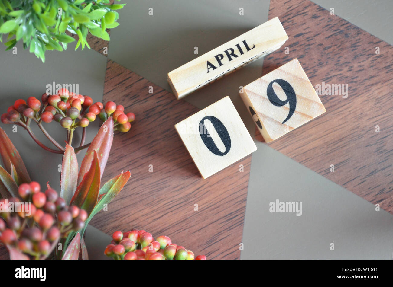Date of April month. Diamond wood table for background Stock Photo - Alamy