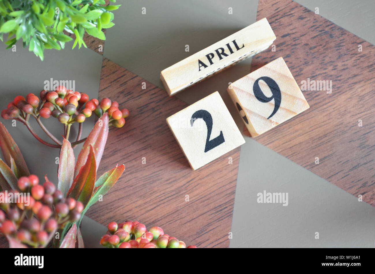 Date of April month. Diamond wood table for background Stock Photo - Alamy