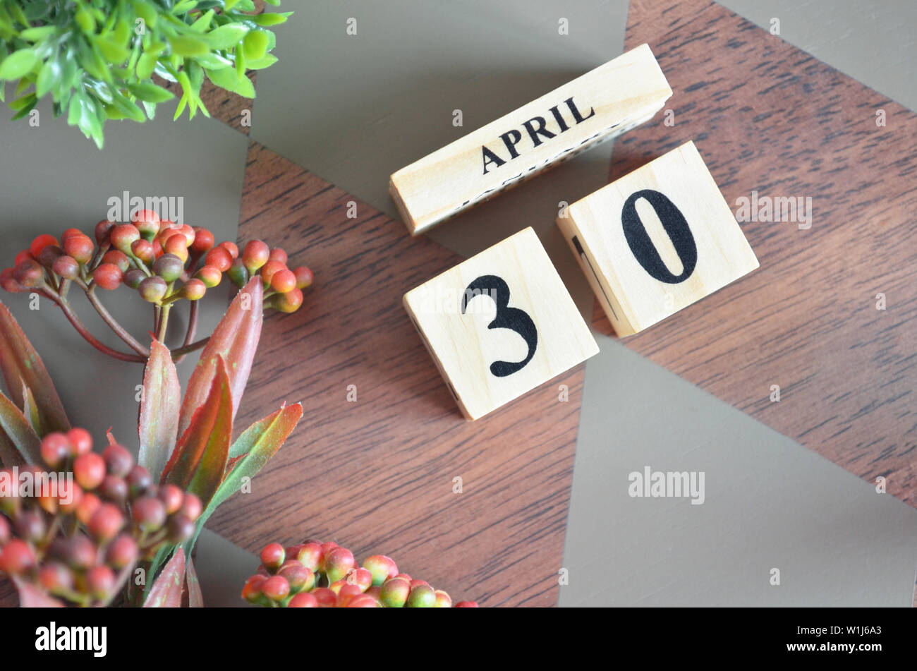 Date of April month. Diamond wood table for background Stock Photo - Alamy
