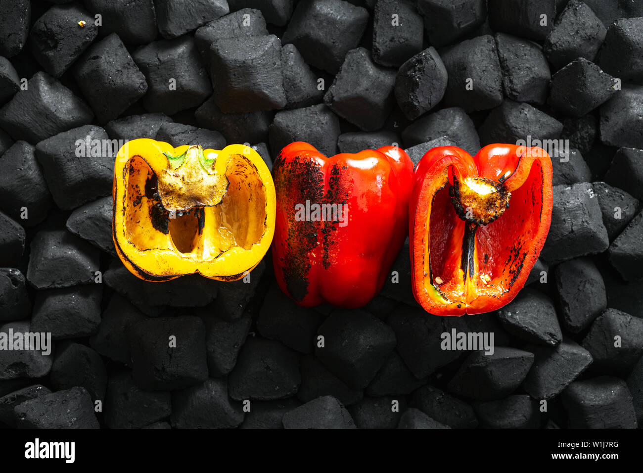 Cooked on grilled pepper over a charcoal top view Stock Photo - Alamy