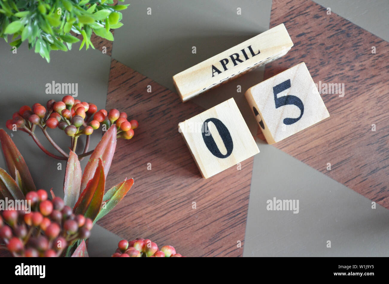 Date of April month. Diamond wood table for background Stock Photo - Alamy