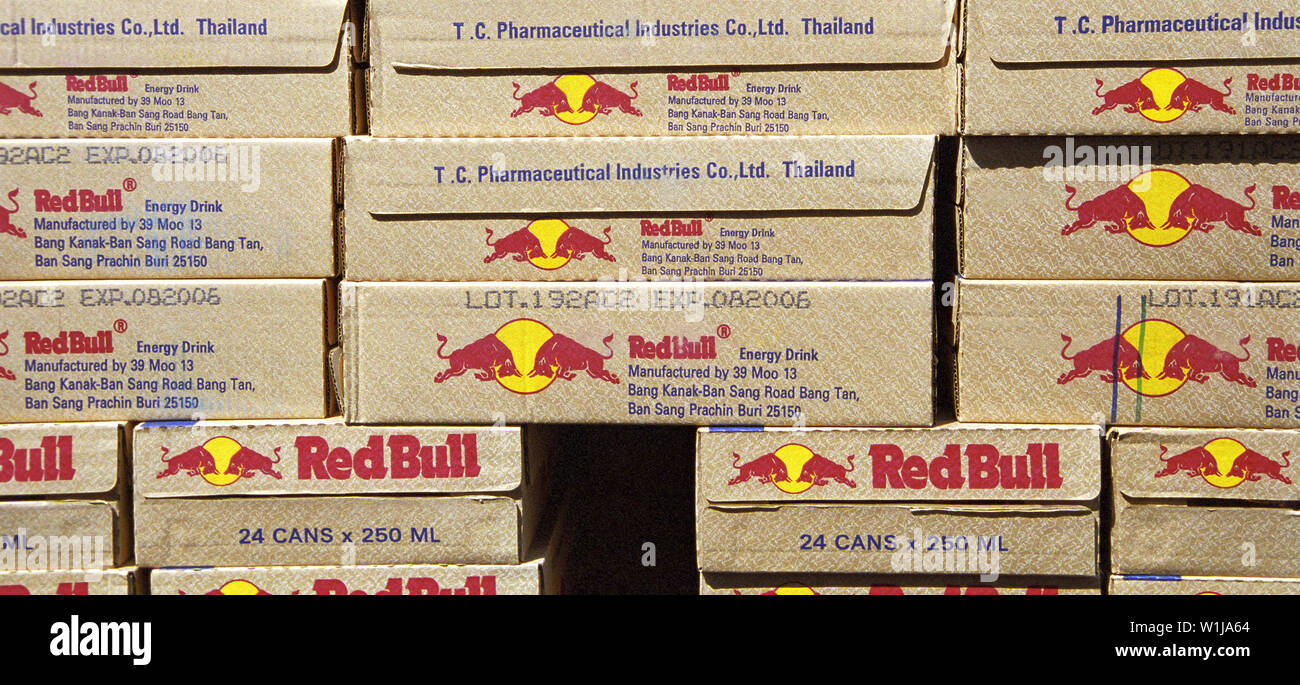 singapore, singapore - march 14, 2005: cartons with cans of red bull ...