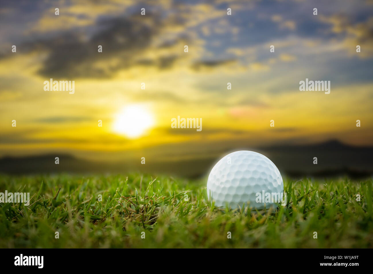 golf-ball on course sunsets soft focus Stock Photo - Alamy