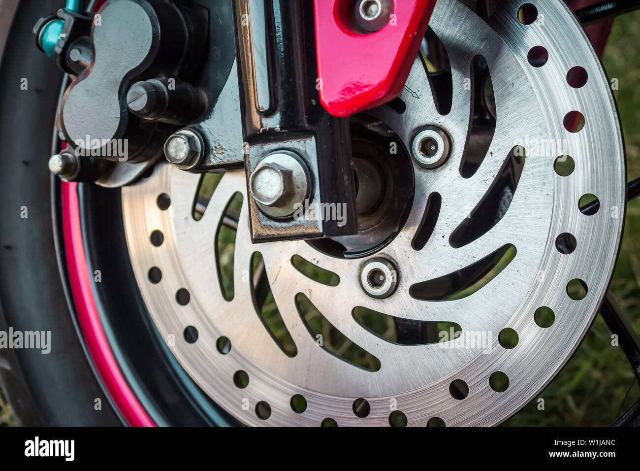 Disk partitioning motorcycle tires in the front and close Stock Photo ...
