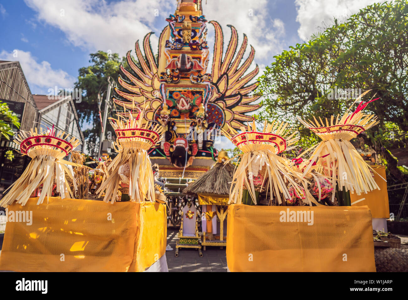 Bade cremation tower with traditional balinese sculptures of demons and ...