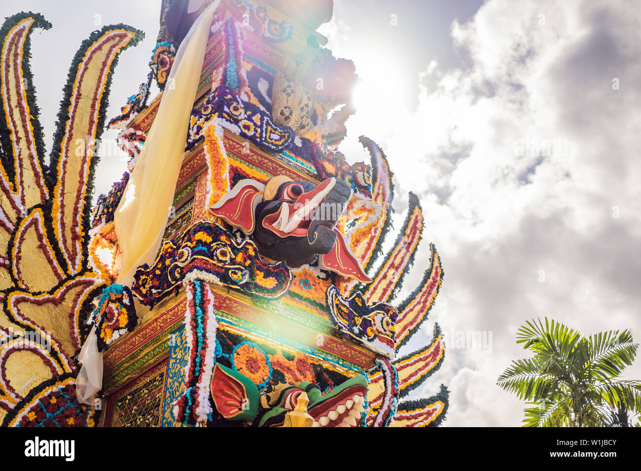 Bade cremation tower with traditional balinese sculptures of demons and ...