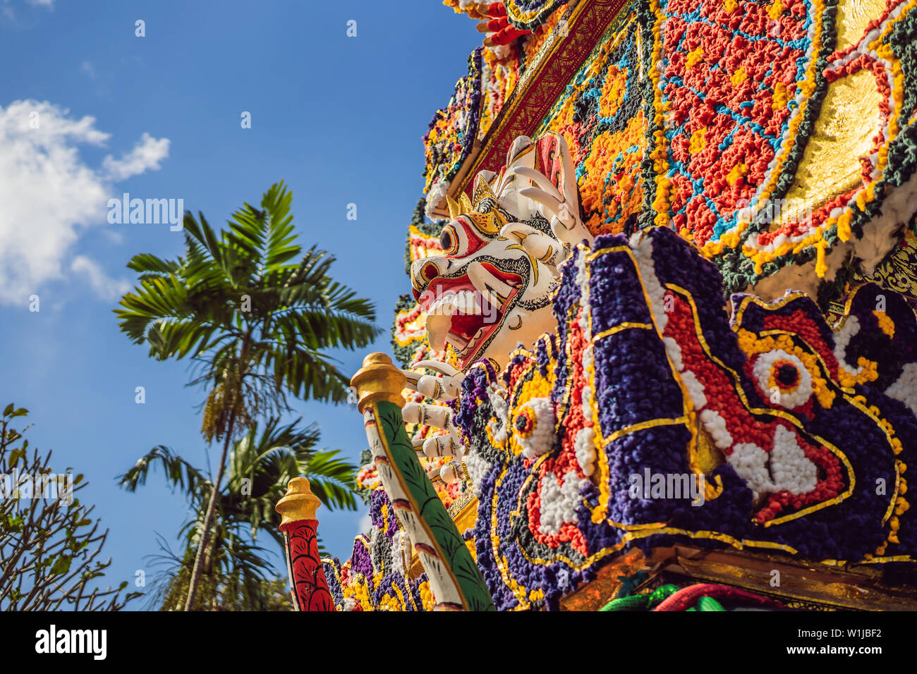 Bade cremation tower with traditional balinese sculptures of demons and ...