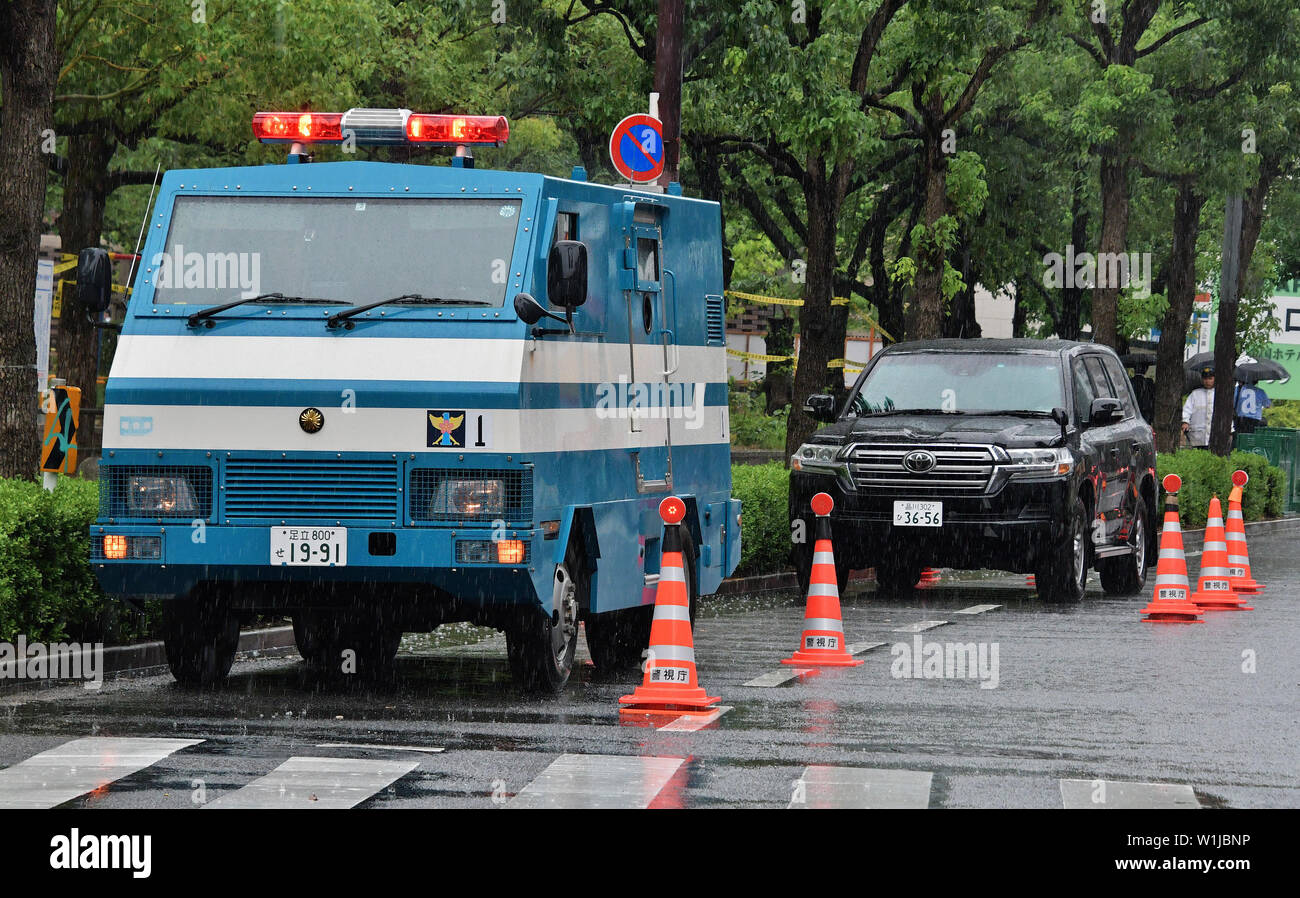 Anti-terrorist armored vehicle stands by in front of the Imperial Hotel ...