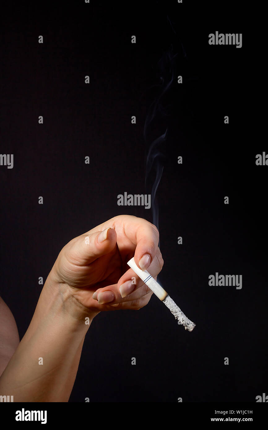 Smoldering cigarette hi-res stock photography and images - Alamy