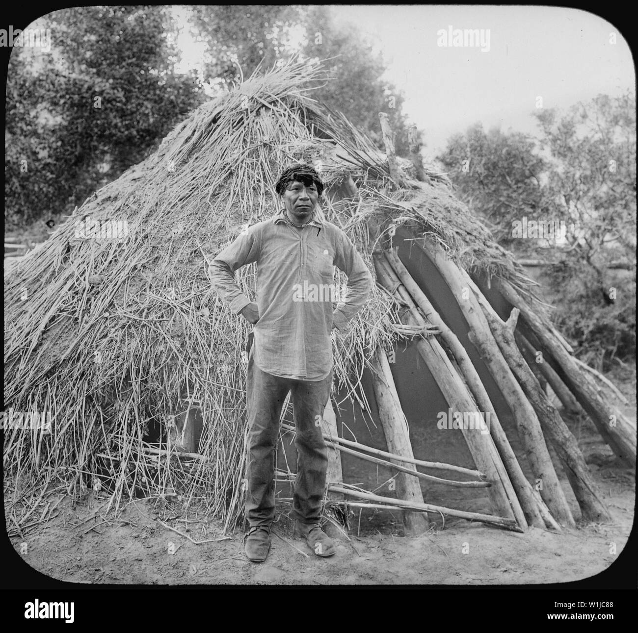 Summer skin tent with an old Eskimo woman in foreground, Point Barrow ...