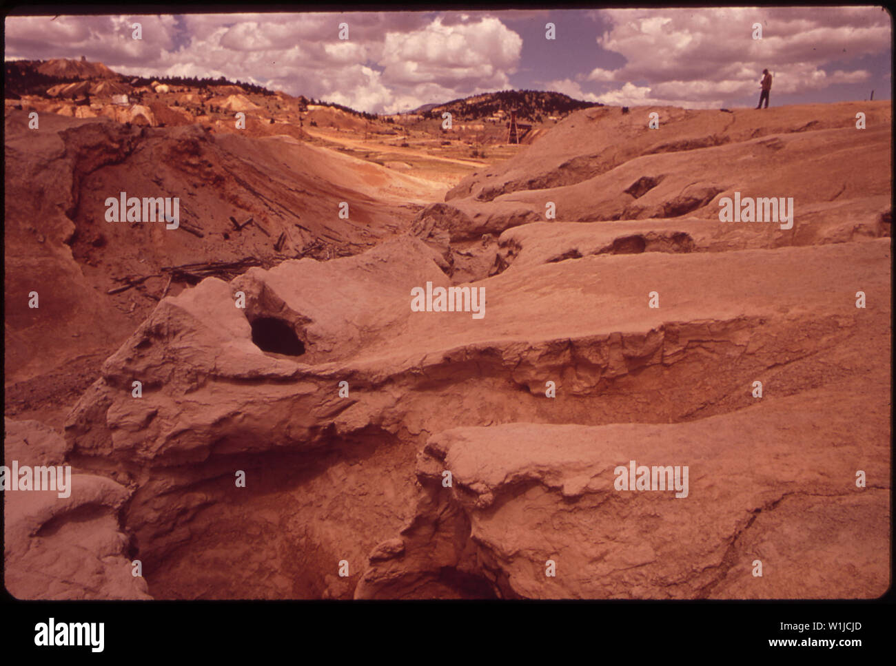 TAILINGS PILES AND BARREN LAND REMAINED AFTER A GOLD MILL WAS ABANDONED ...
