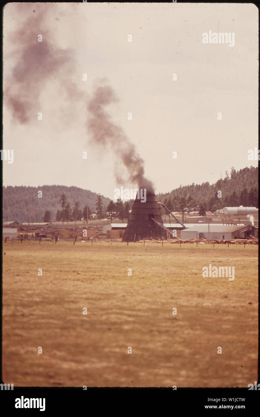 TEEPEE BURNER INCINERATES WOODCHIPS AND SAWDUST FROM LUMBER MILL Stock ...