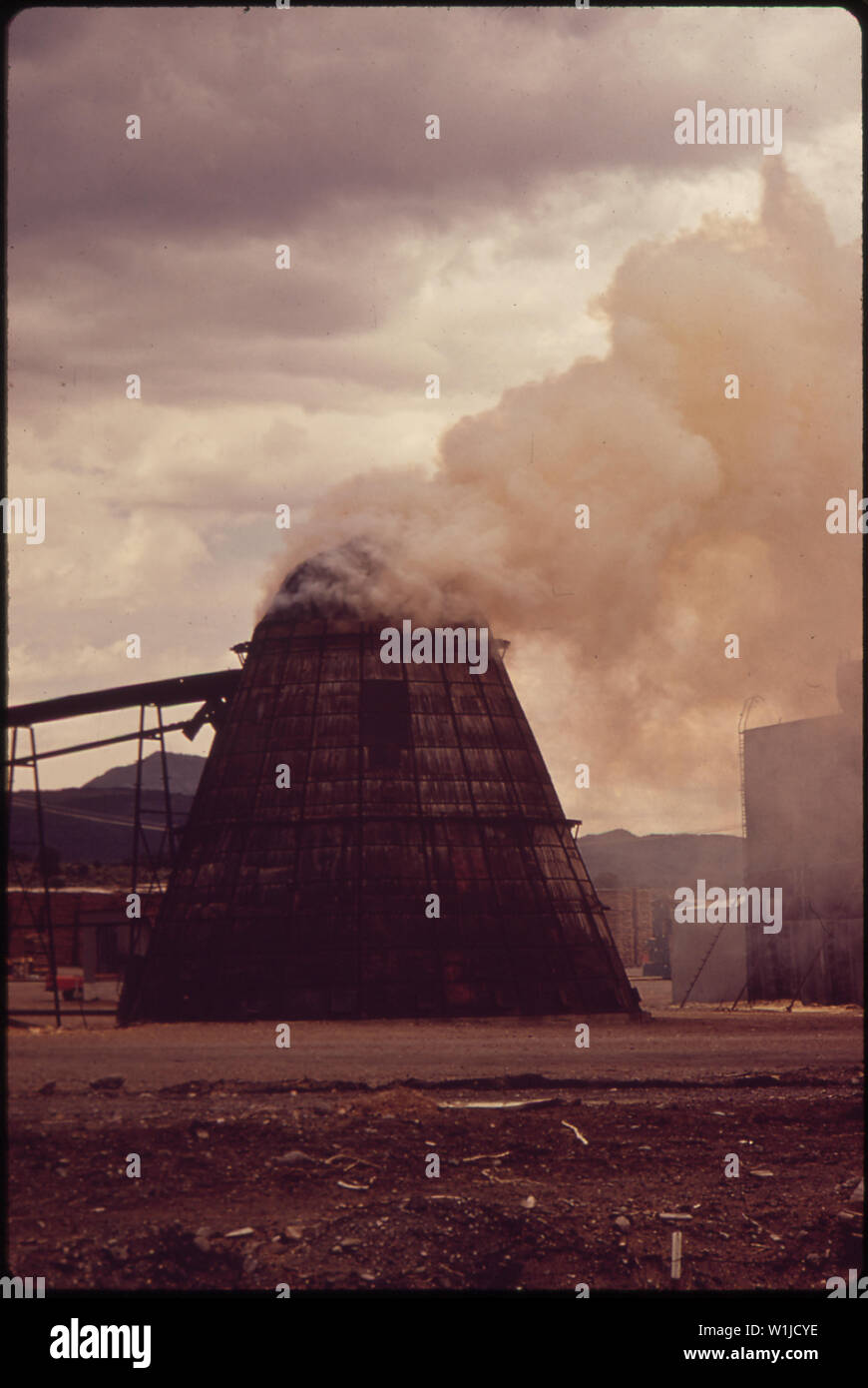TEEPEE BURNER INCINERATES WOODCHIPS AND SAWDUST FROM THE LUMBERMILL ...