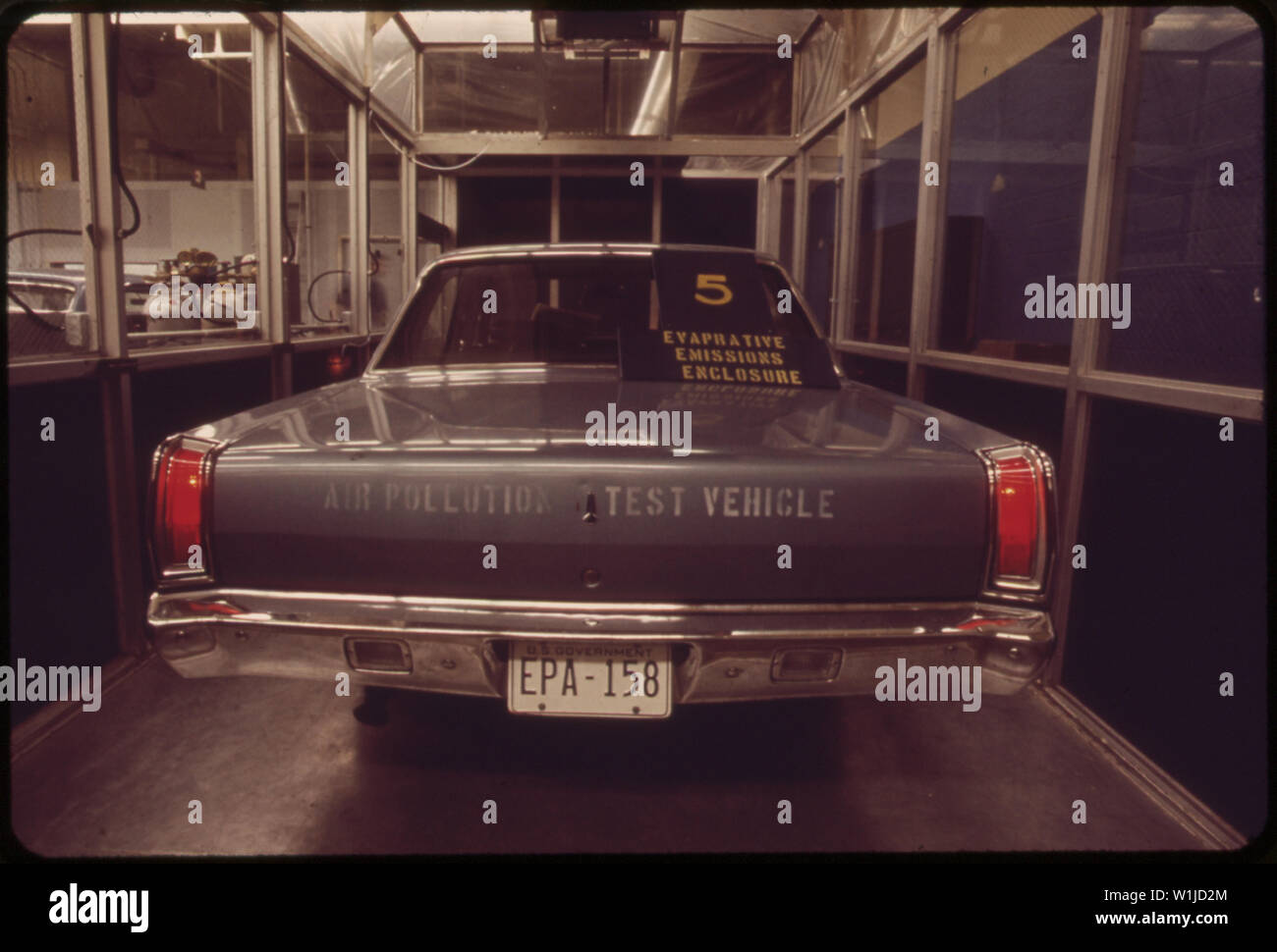 TESTING A NEW CAR IN THE EVAPORATIVE EMISSION ENCLOSURE OF EPA'S ANN ...