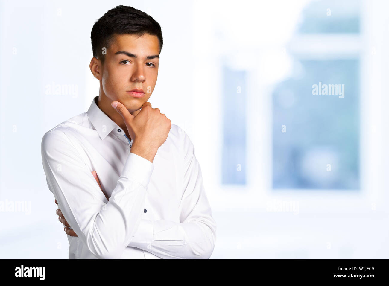 young man thinking Stock Photo - Alamy