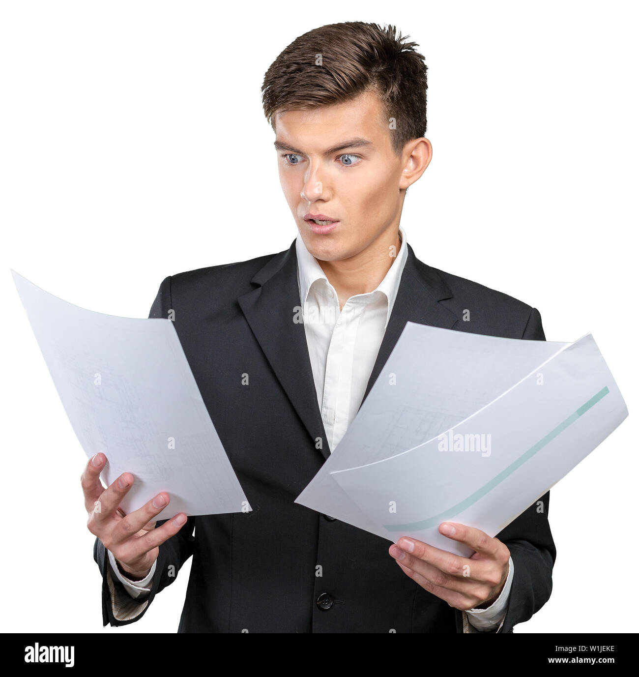 Busy businessman with loads of paperwork Stock Photo - Alamy