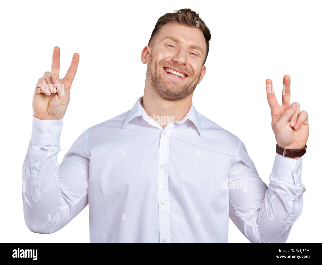 Portrait of a young man smiling with victory sign Stock Photo - Alamy