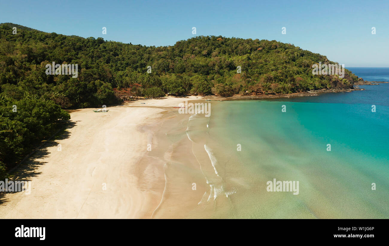 above view tropical sandy beach and blue water. Nagtabon. Palawan ...