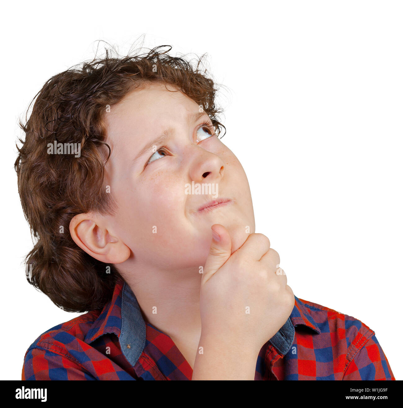 cute young boy thinking Stock Photo - Alamy