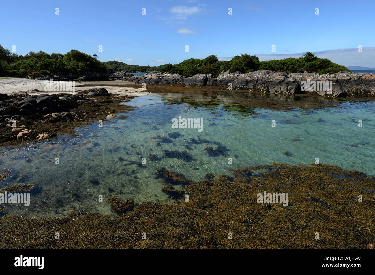 The Walk around the headland at Plockton leads to several coral beaches ...