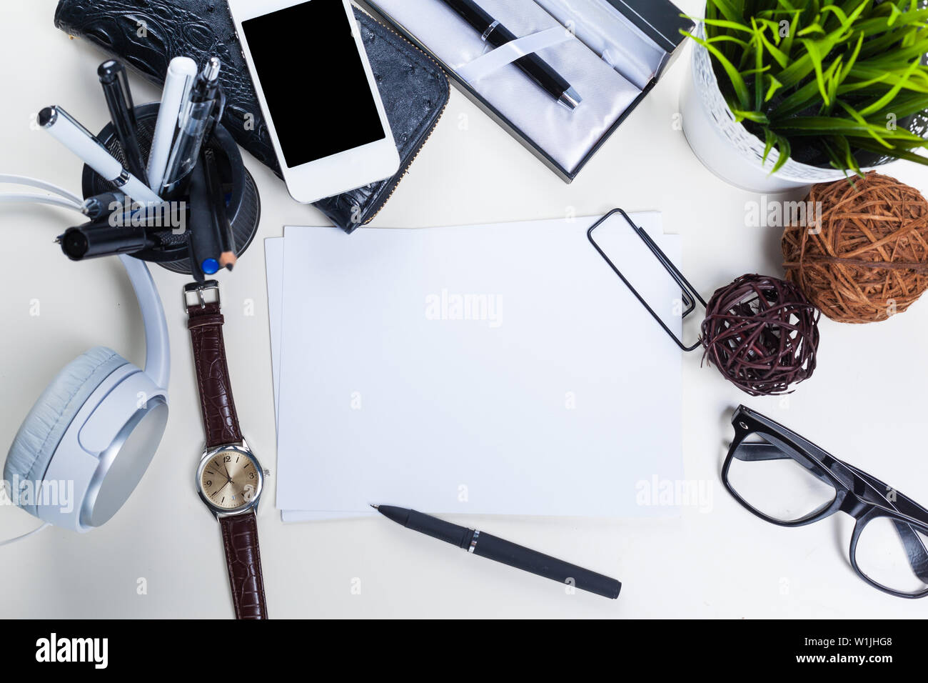 White office desk table with a lot of things on it. Top view Stock ...
