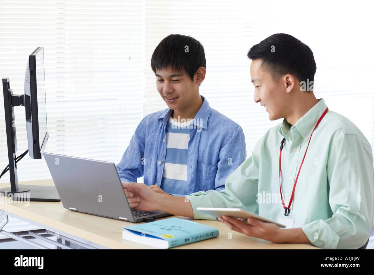 Japanese teenager studying programming Stock Photo - Alamy