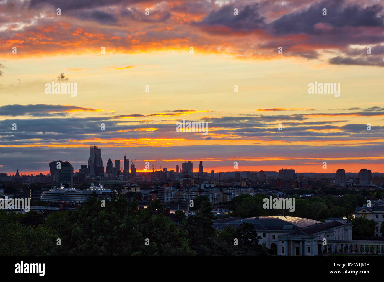 Sequence of images of a sunset over London Skyline from Greenwich Park ...