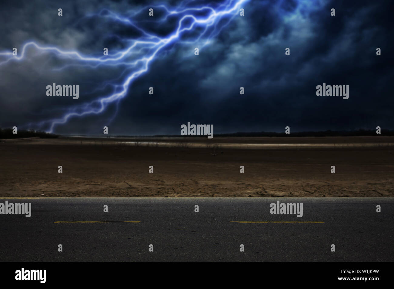 The path through the desert storm Stock Photo - Alamy