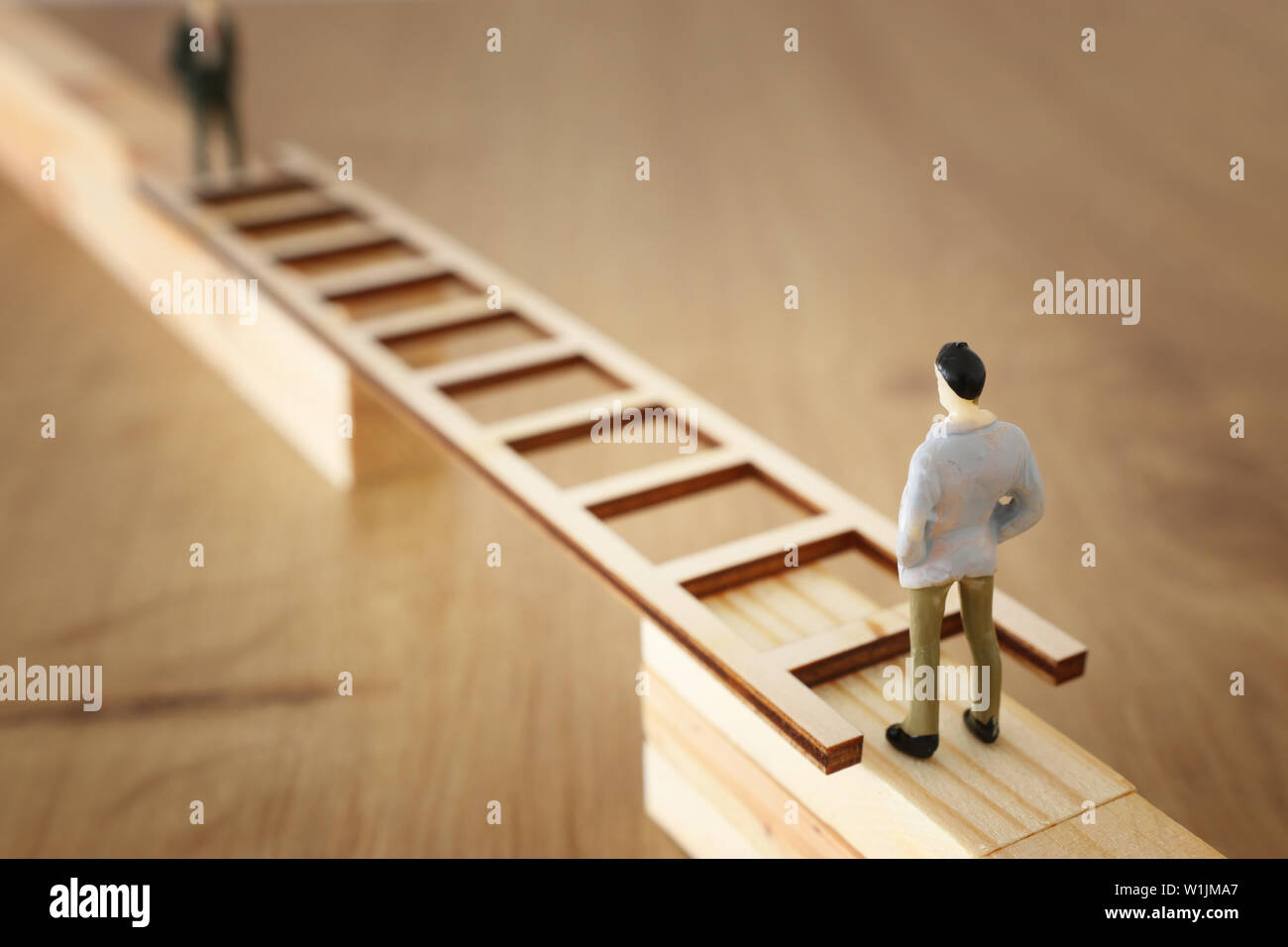 business concept picture of challenge. A man stands on the edge of a ...