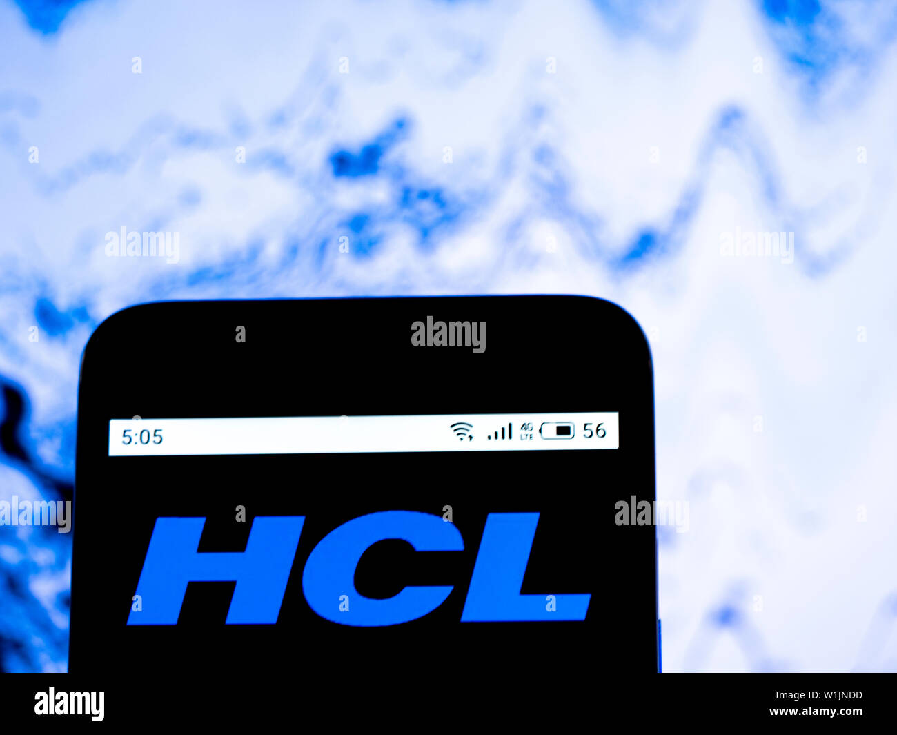 In this photo illustration the HCL Technologies Limited logo is seen displayed on a smartphone ...