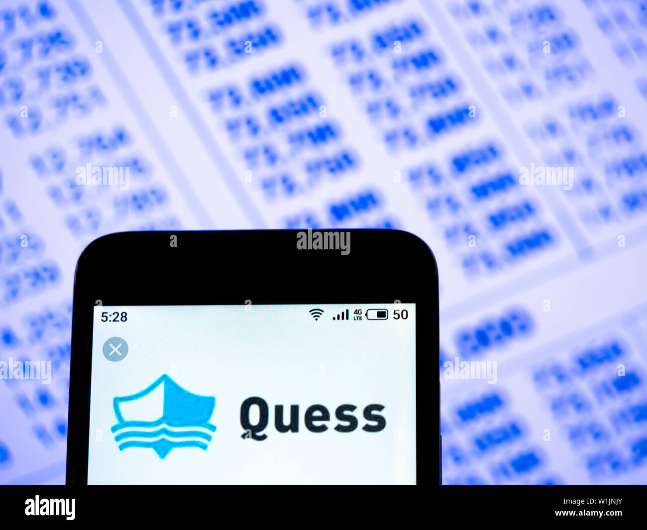 In this photo illustration the Quess Corp Limited logo is seen ...