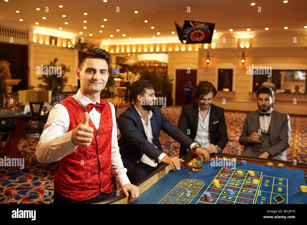 Croupier man hi-res stock photography and images - Alamy