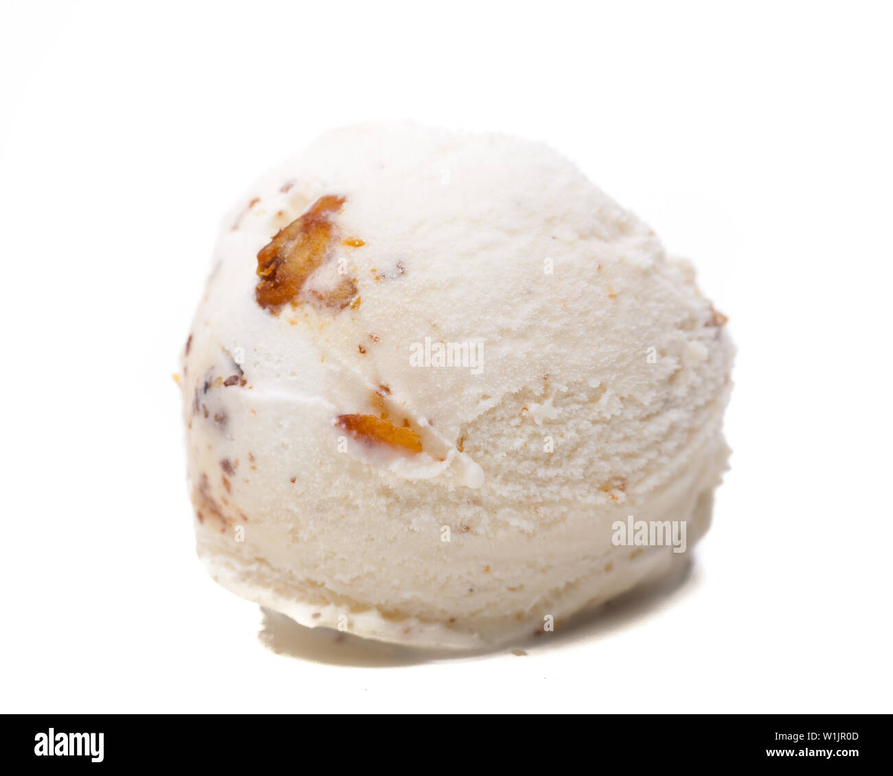 front view of a single walnut ice cream scoop isolated on white ...