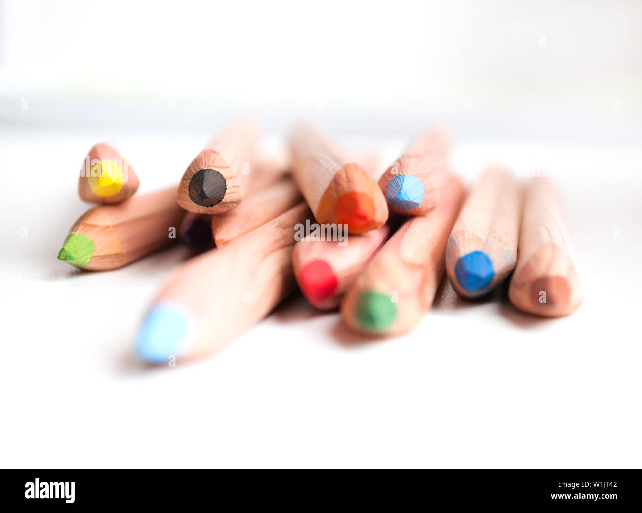 colored pencils on a window sill. Small depth of field Stock Photo - Alamy